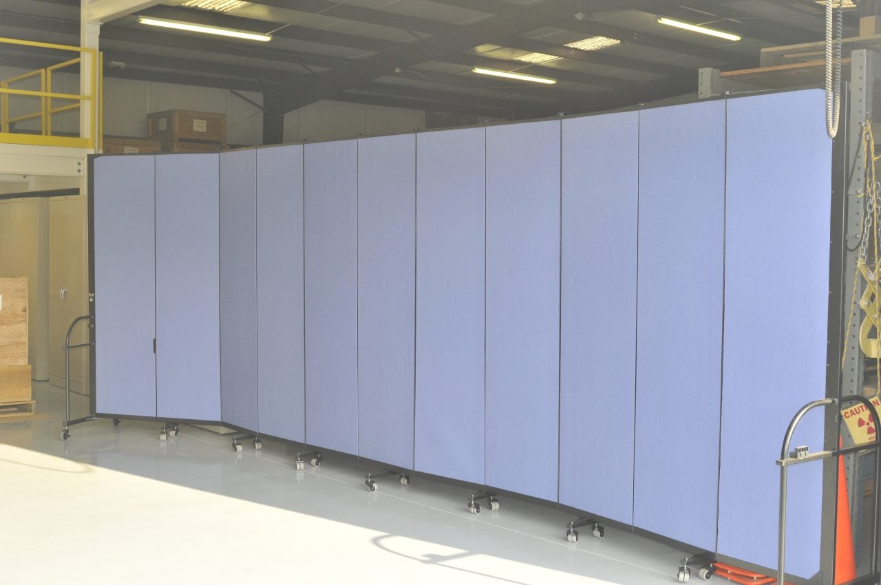 Screenflex Rolling Dividers Separate a Factory into Usable Space